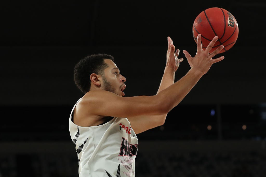 Harvey superb as Hawks destroy Bullets